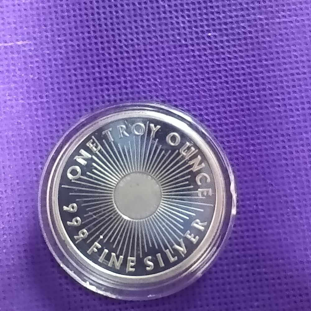 American Sunshine Minting 1 oz Silver coin. - Own4Less